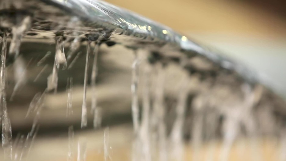 Water dripping off of metal surface | ClipStock