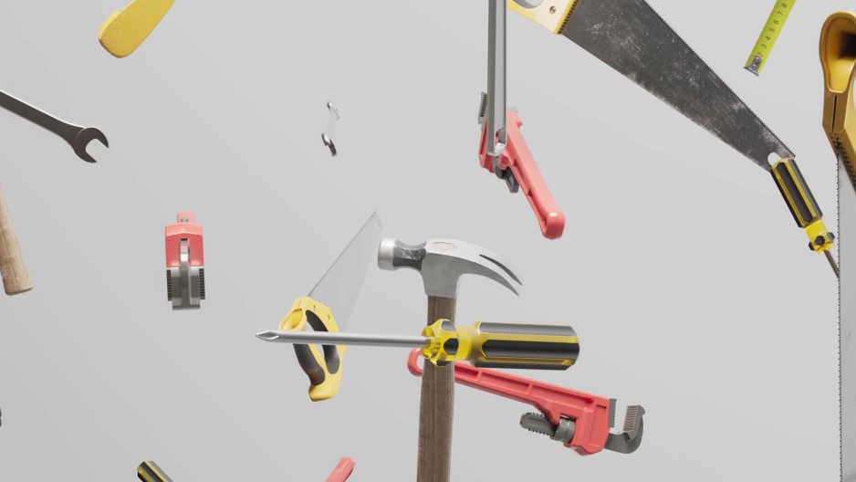 Hardware tools floating in mid air in front of white background ...