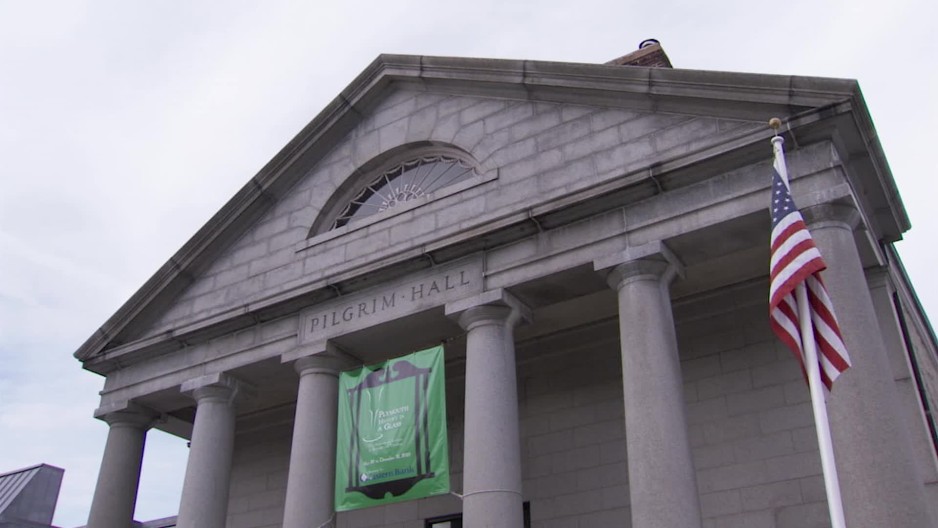 Low angle shot of the Pilgrim Hall sign | ClipStock