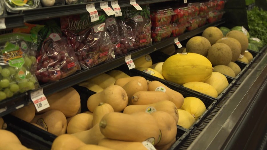 Fruits and vegetables in produce section of grocery store | ClipStock