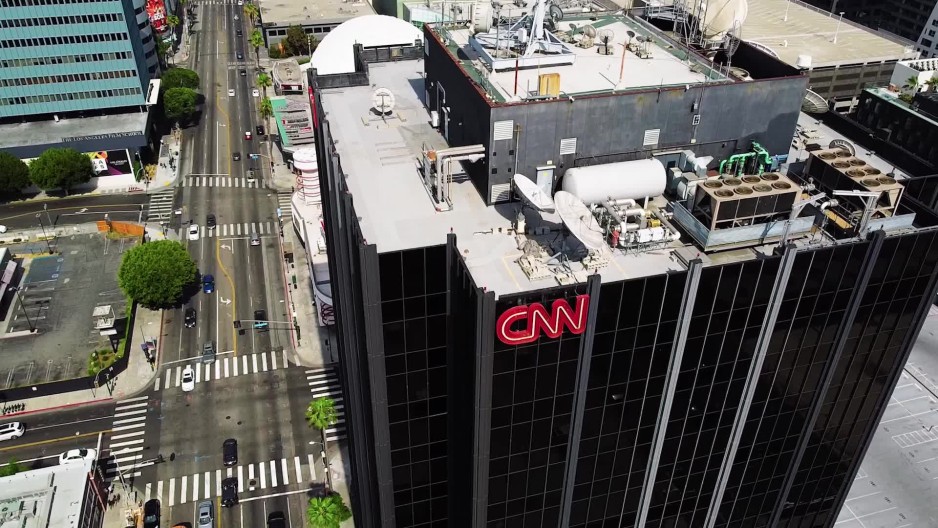 CNN tower in Central Hollywood with traffic in background | ClipStock