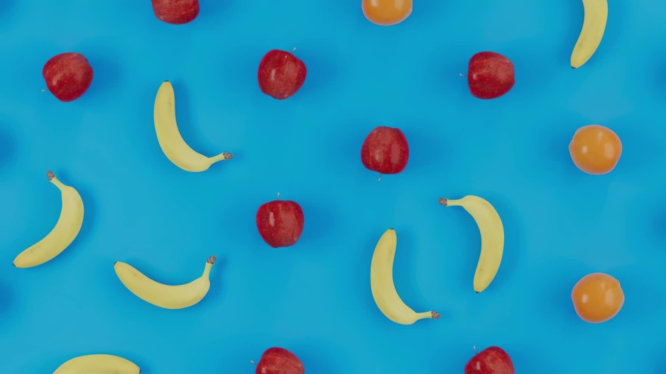Multiple assorted fruits rotating around stop motion animation style in ...