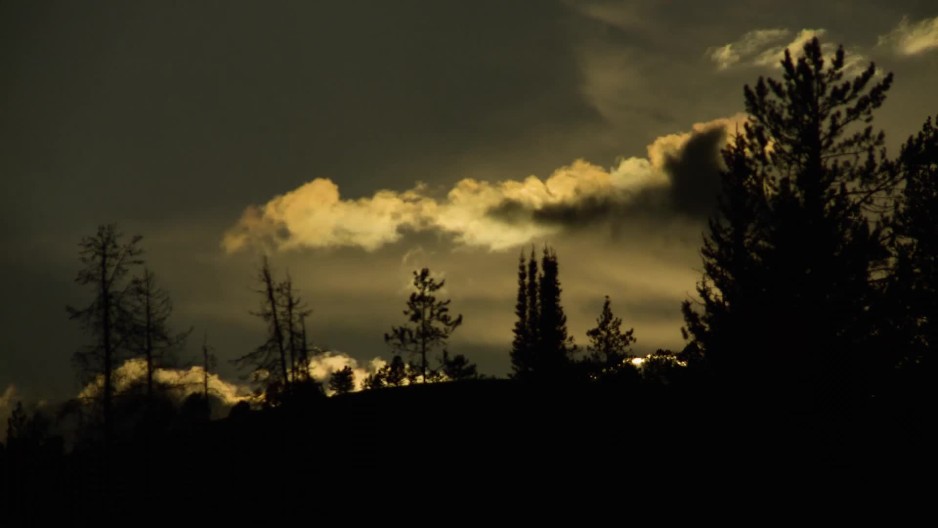 Time-lapse of sun dropping below hill at dusk | ClipStock