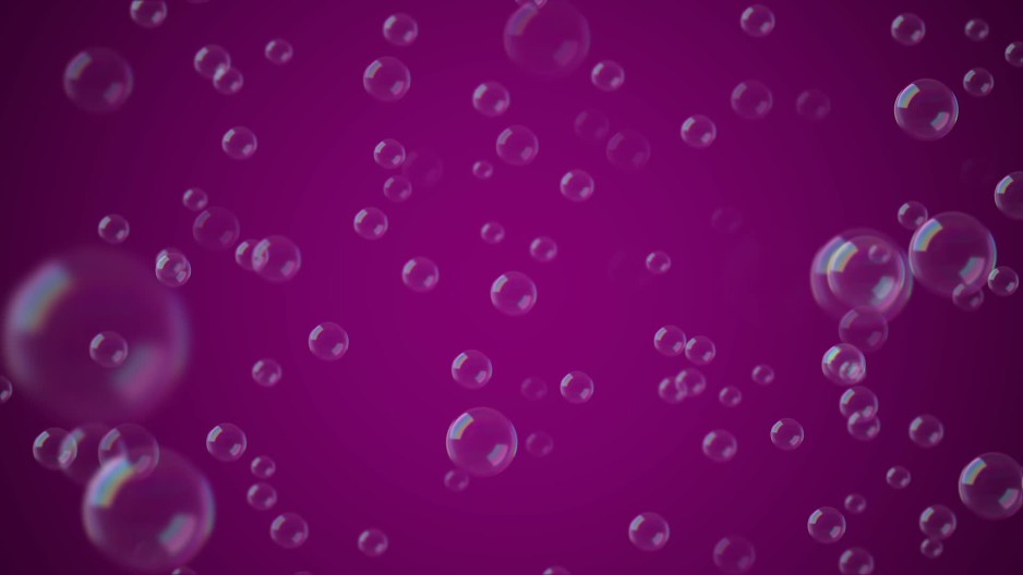 Bubbles floating up on pink background | ClipStock
