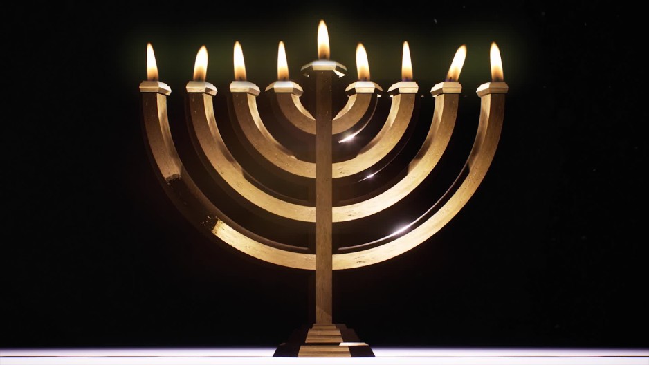 Hanukkah menorah on table animation on black background | ClipStock