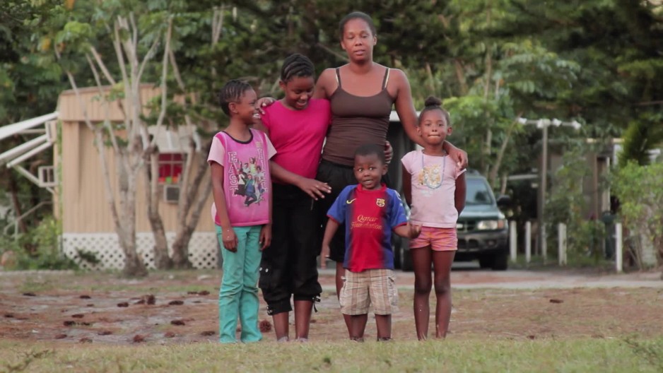 Poor black family living in poverty single Mother raising four children ...